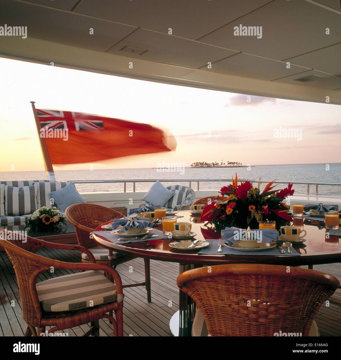 Table set for dinner on luxury yacht Stock Photo - Alamy