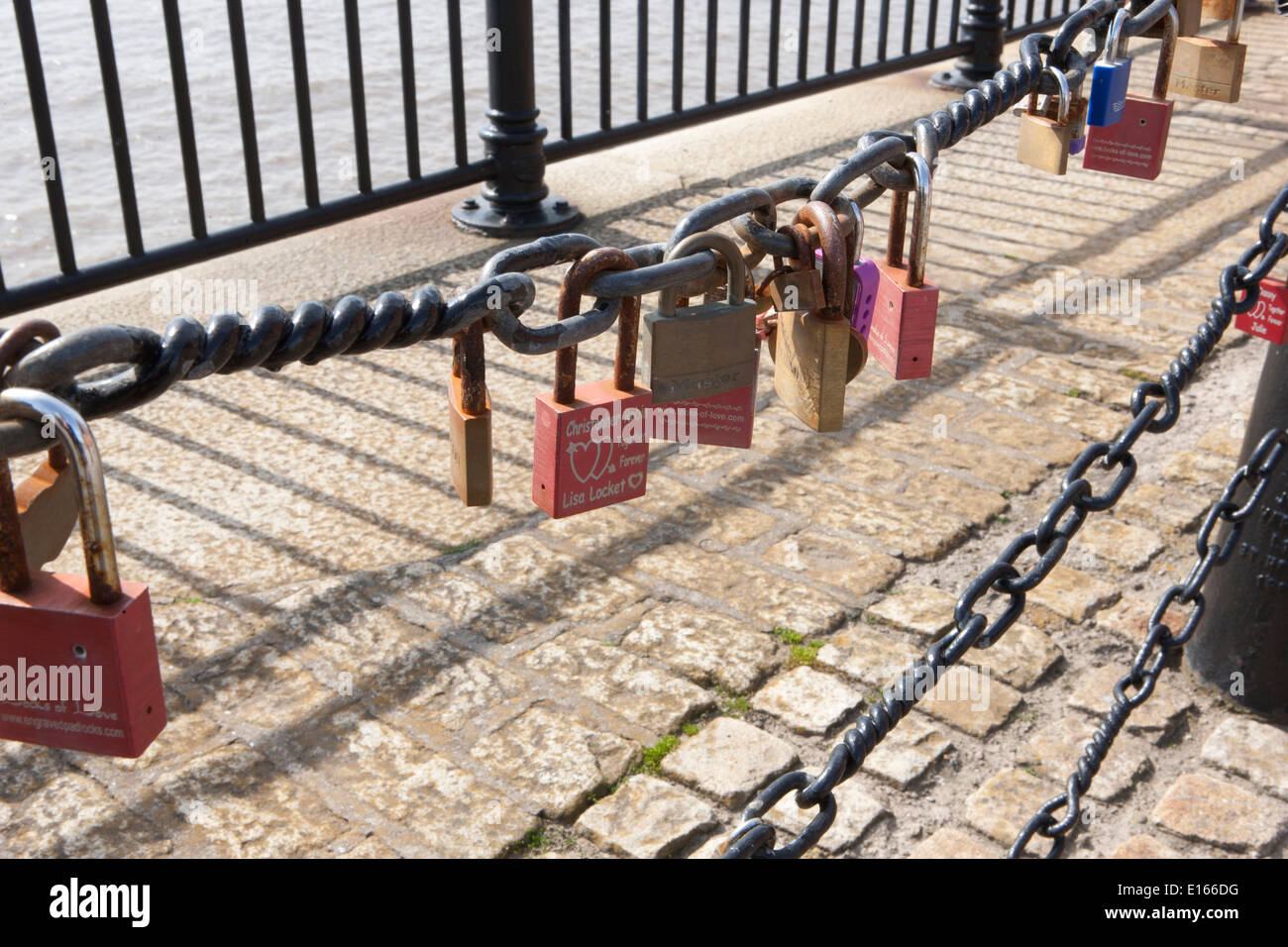 Some of the thousands of padlocks on railing beside the River Mersey in ...