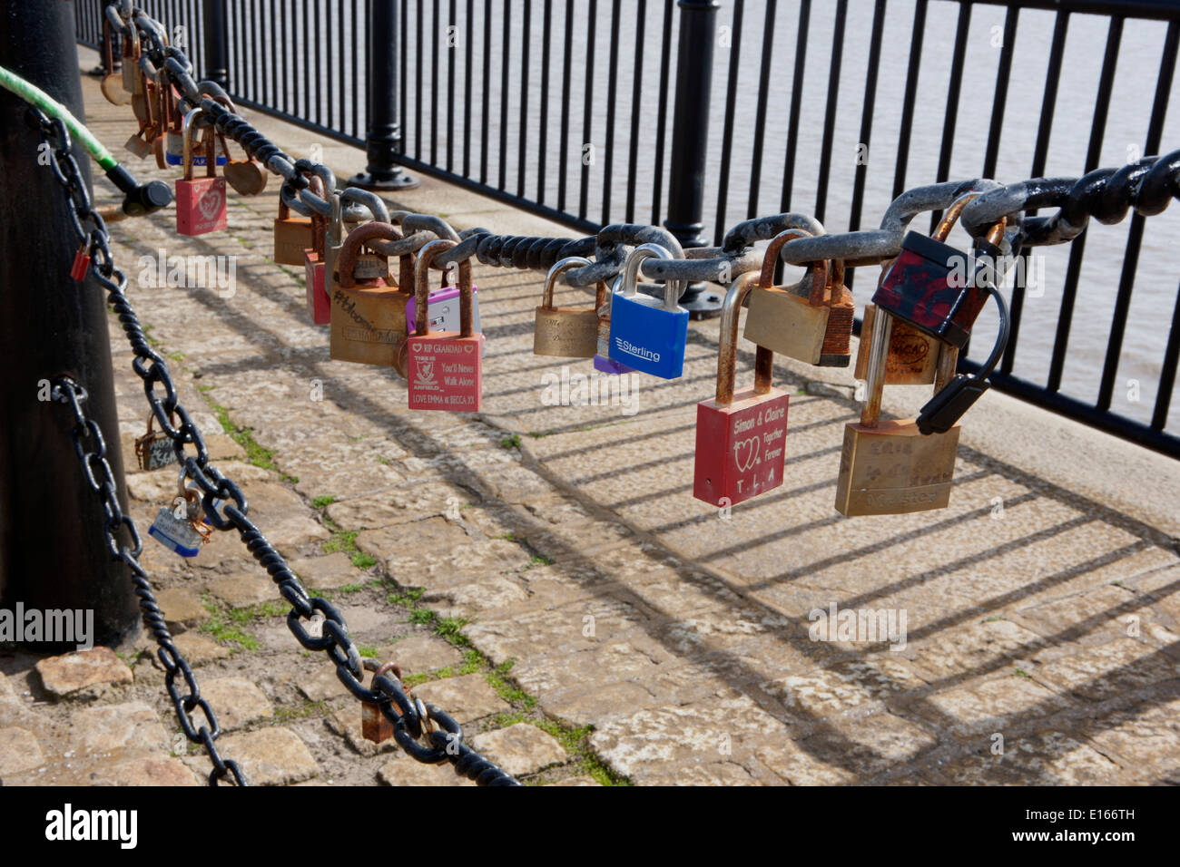 Some of the thousands of padlocks on railing beside the River Mersey in ...