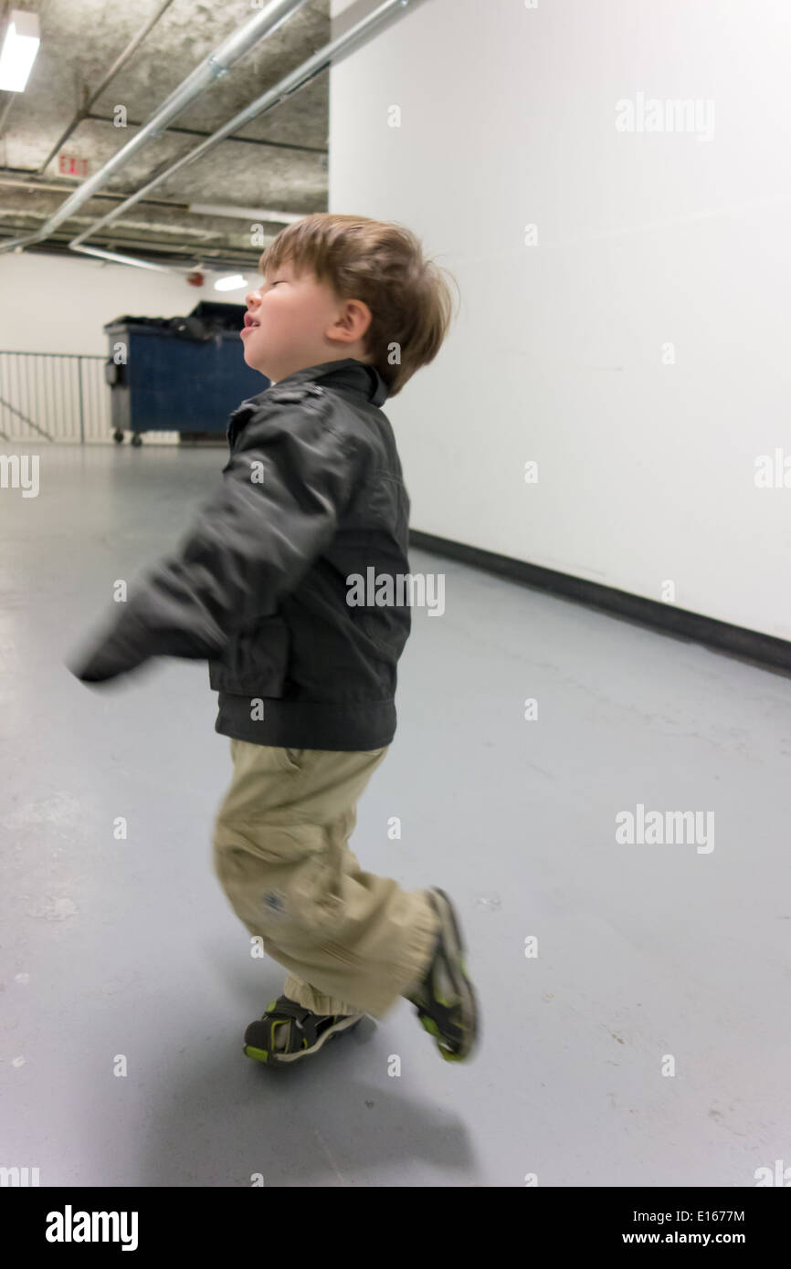Side profile of a boy playing Stock Photo - Alamy