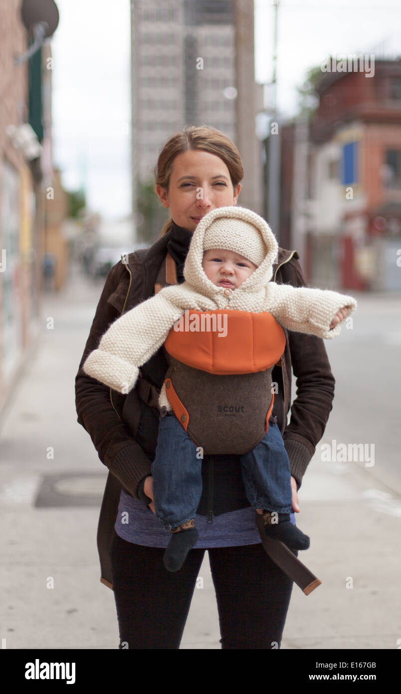 Portrait of a mother carrying her baby boy hi-res stock photography and ...