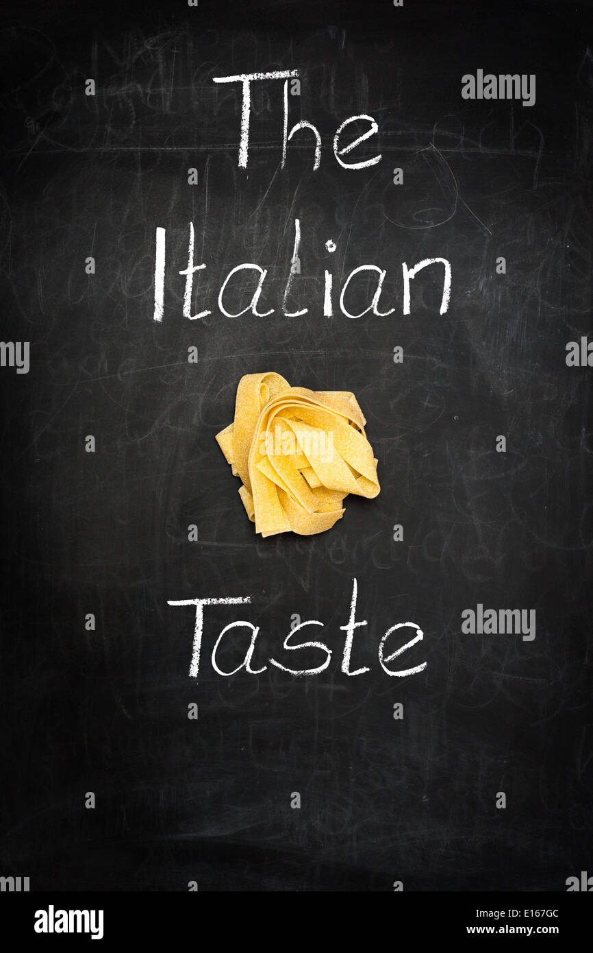 The Italian Taste, Pasta on Blackboard Stock Photo - Alamy