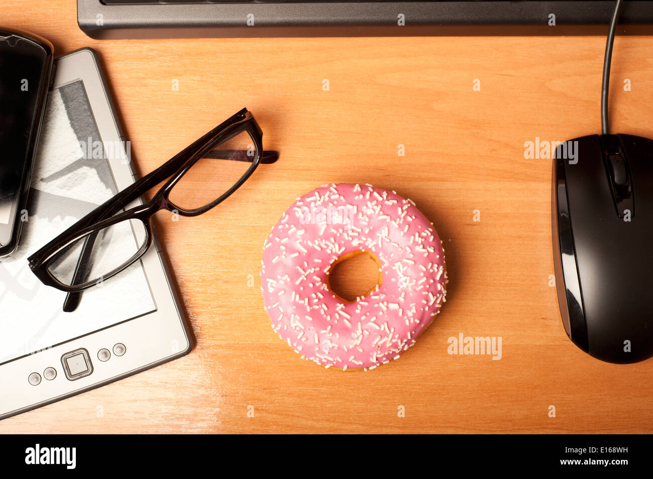 doughnut and office table Stock Photo - Alamy