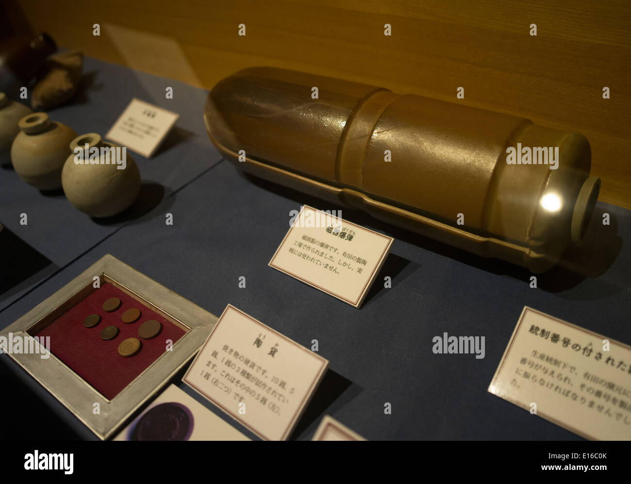 Bombs, coins and grenade made from pottery at . Arita Folk and History ...