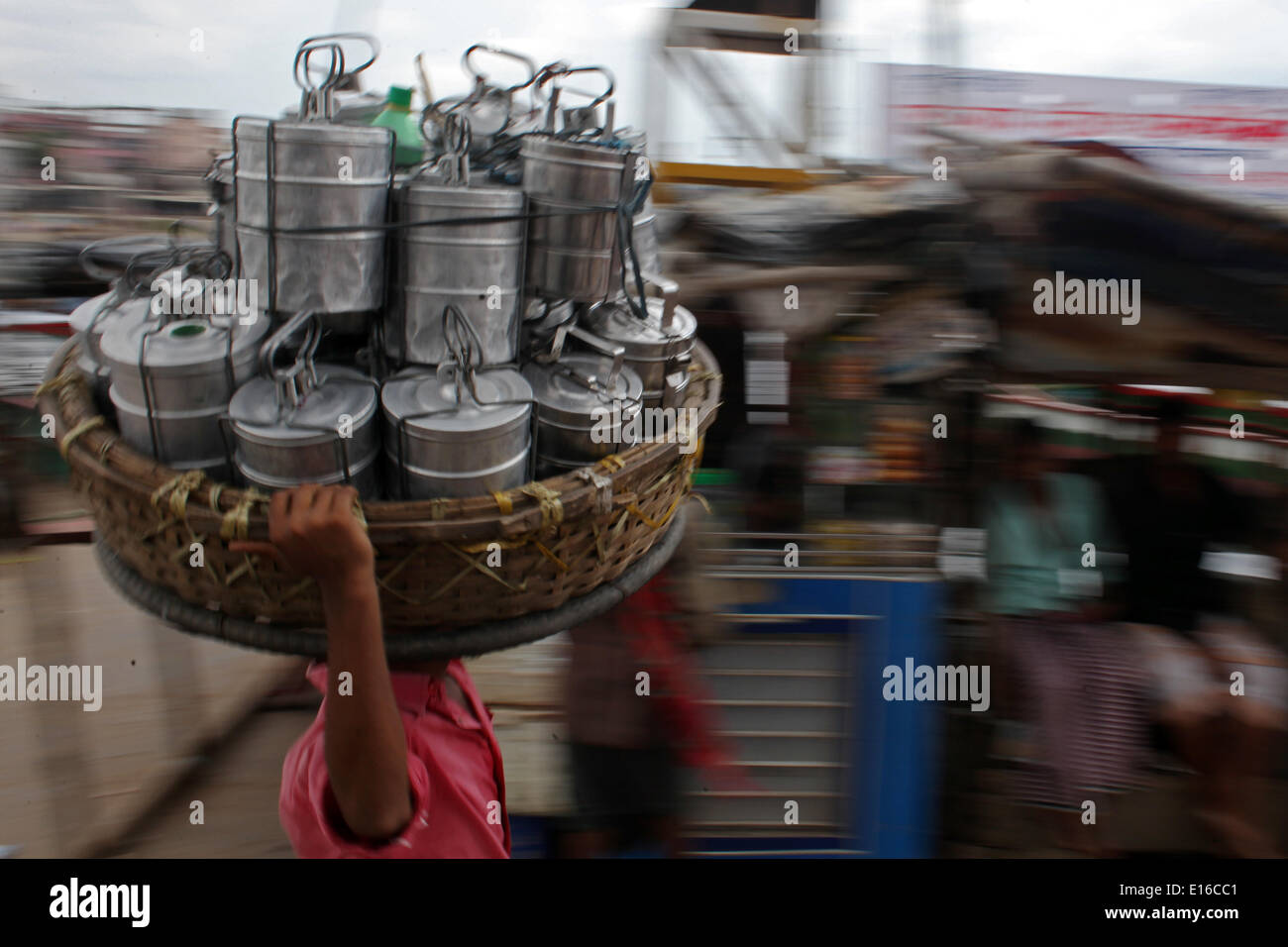 Dhaka Bangladesh 24th May 2014; A man carrying tiffin box to delivery ...