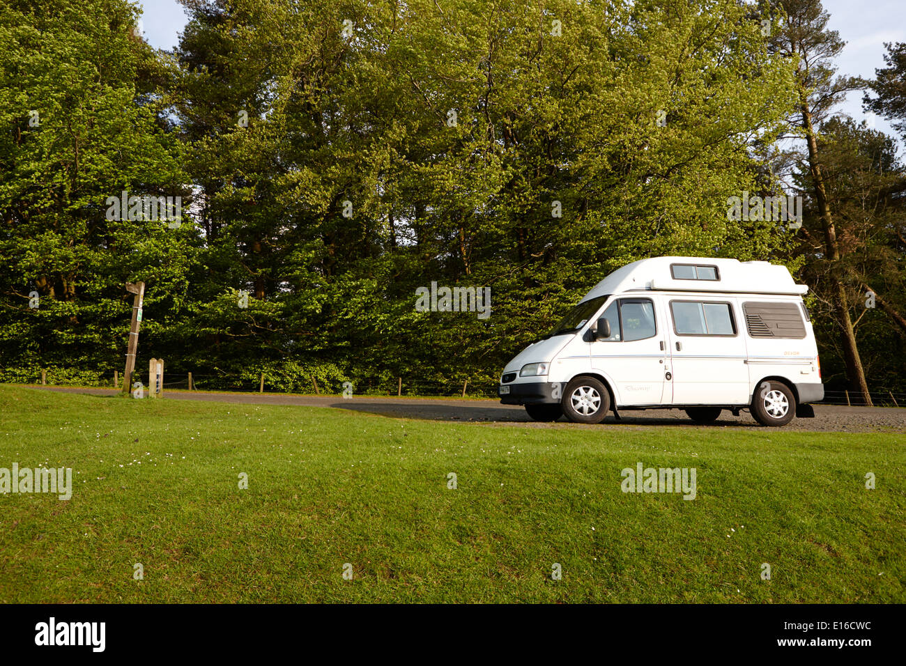 old ford transit campervan parked off the beaten track in layby on ...