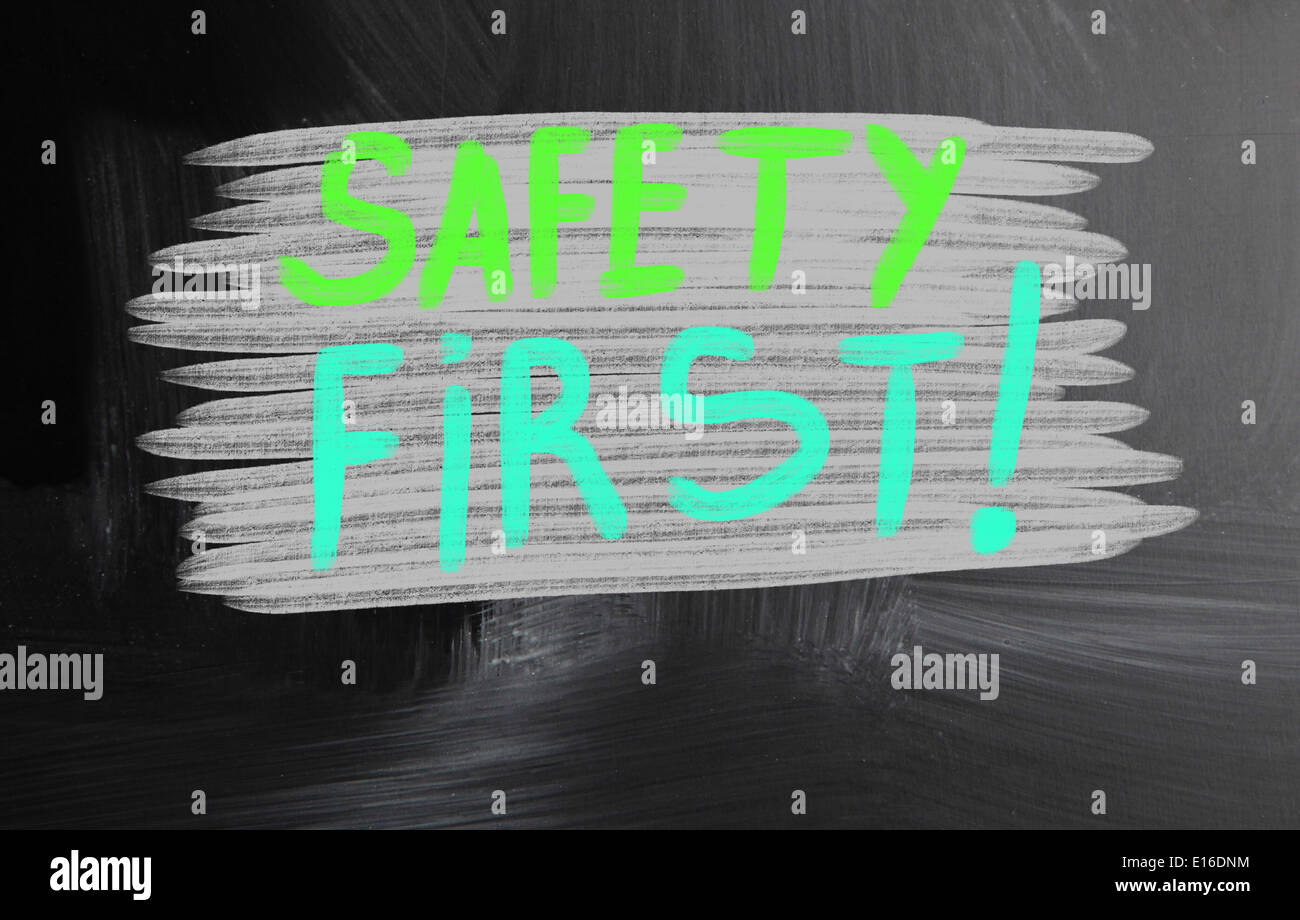 safety first handwritten with chalk on a blackboard Stock Photo - Alamy