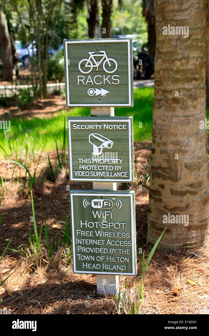 Multiple signs pointing to and giving information on such things as ...