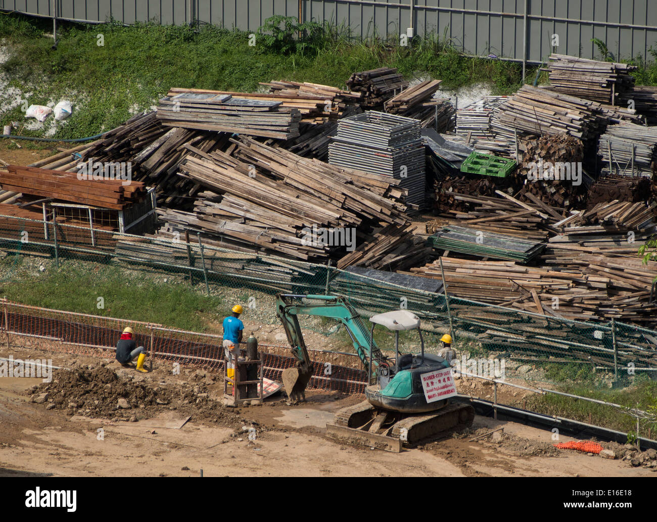 Foreign migrant workers at a construction site in Singapore Stock Photo ...