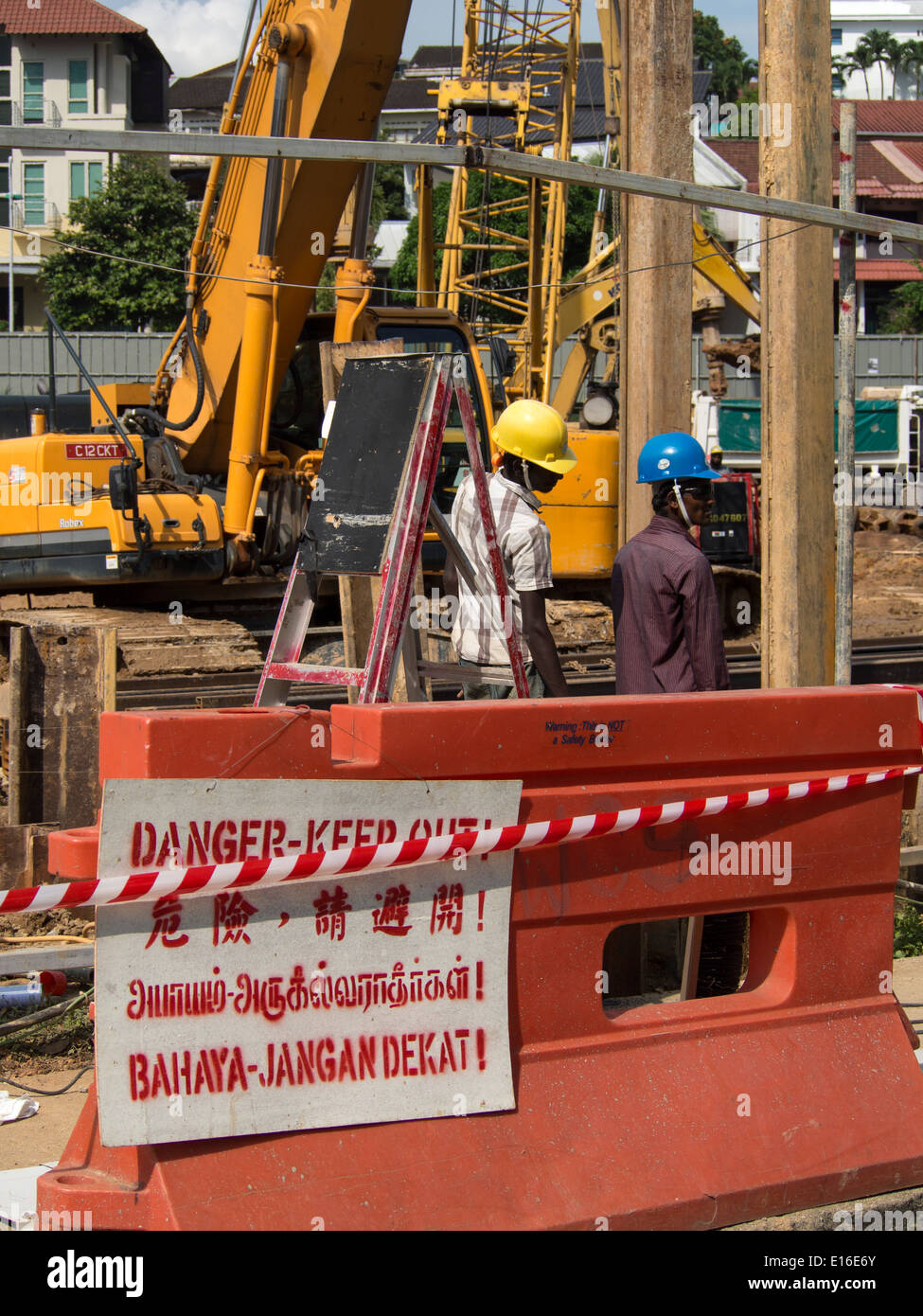 Foreign migrant workers at a construction site in Singapore Stock Photo ...