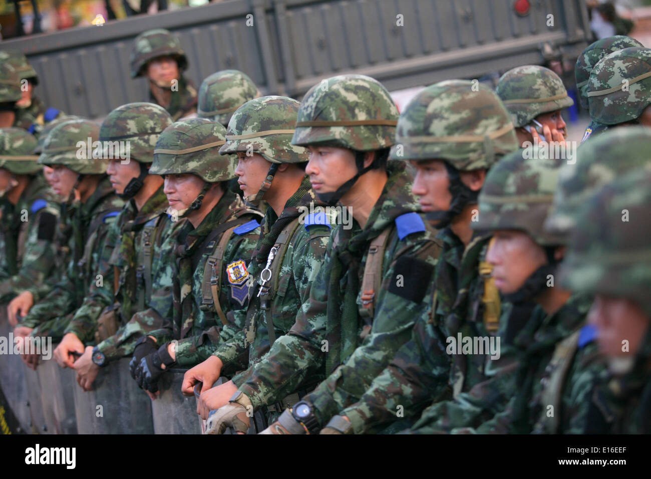 Chiang Mai, Thailand. 24th May, 2014. Thai soldiers stand guard at a ...