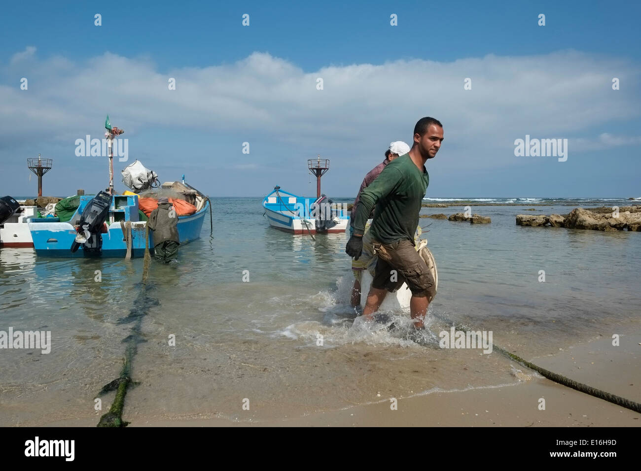 Israeli Arab fishermen returning from fishing at the seacoast of ...