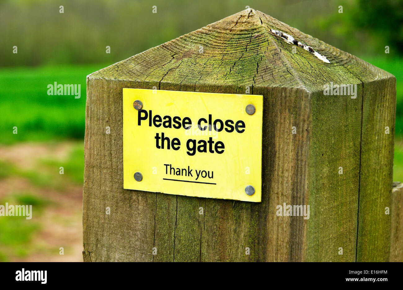 Please Close The Gate Sign on a Wooden Post, UK Stock Photo - Alamy