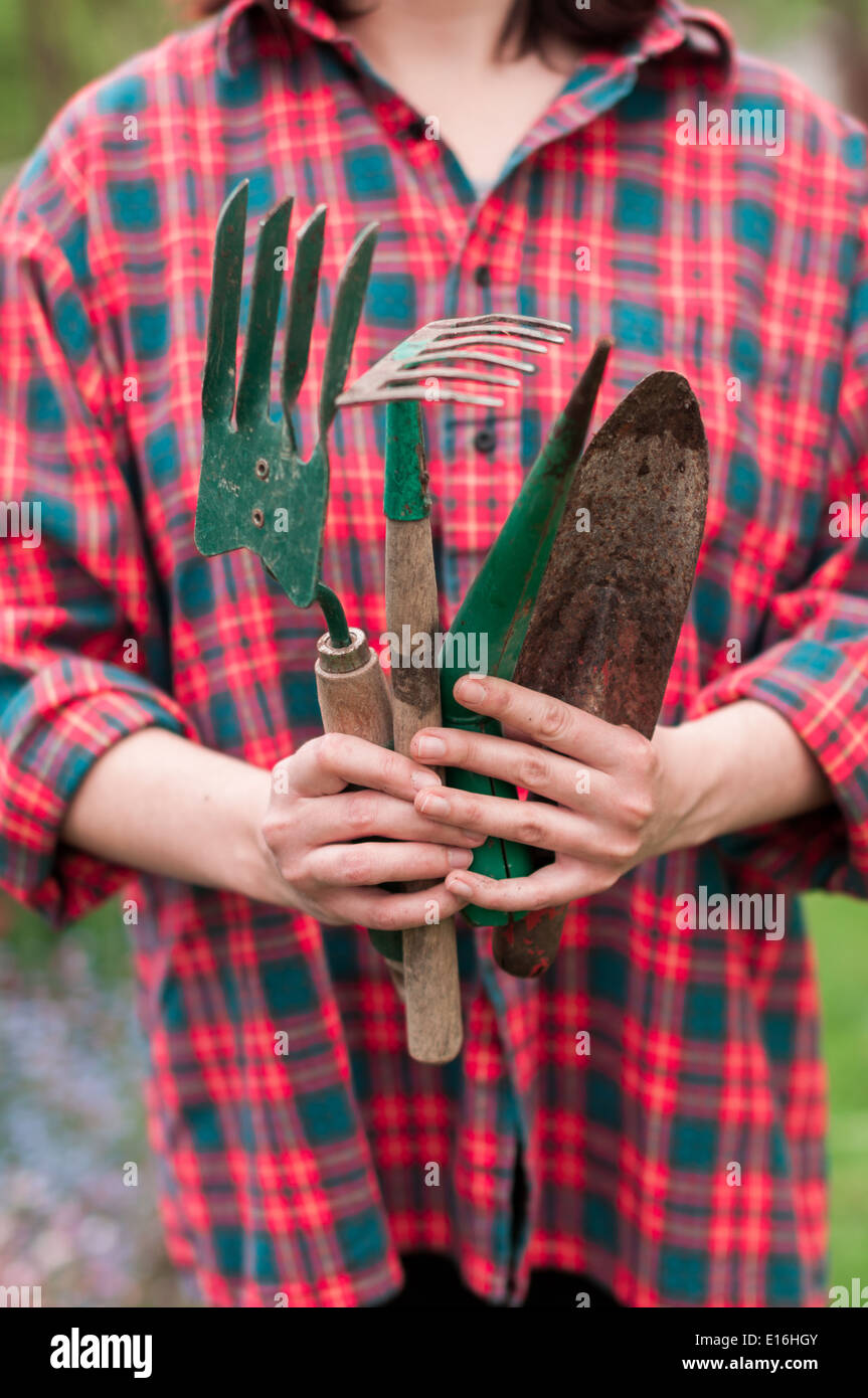 Gardener holding hoe hi-res stock photography and images - Alamy