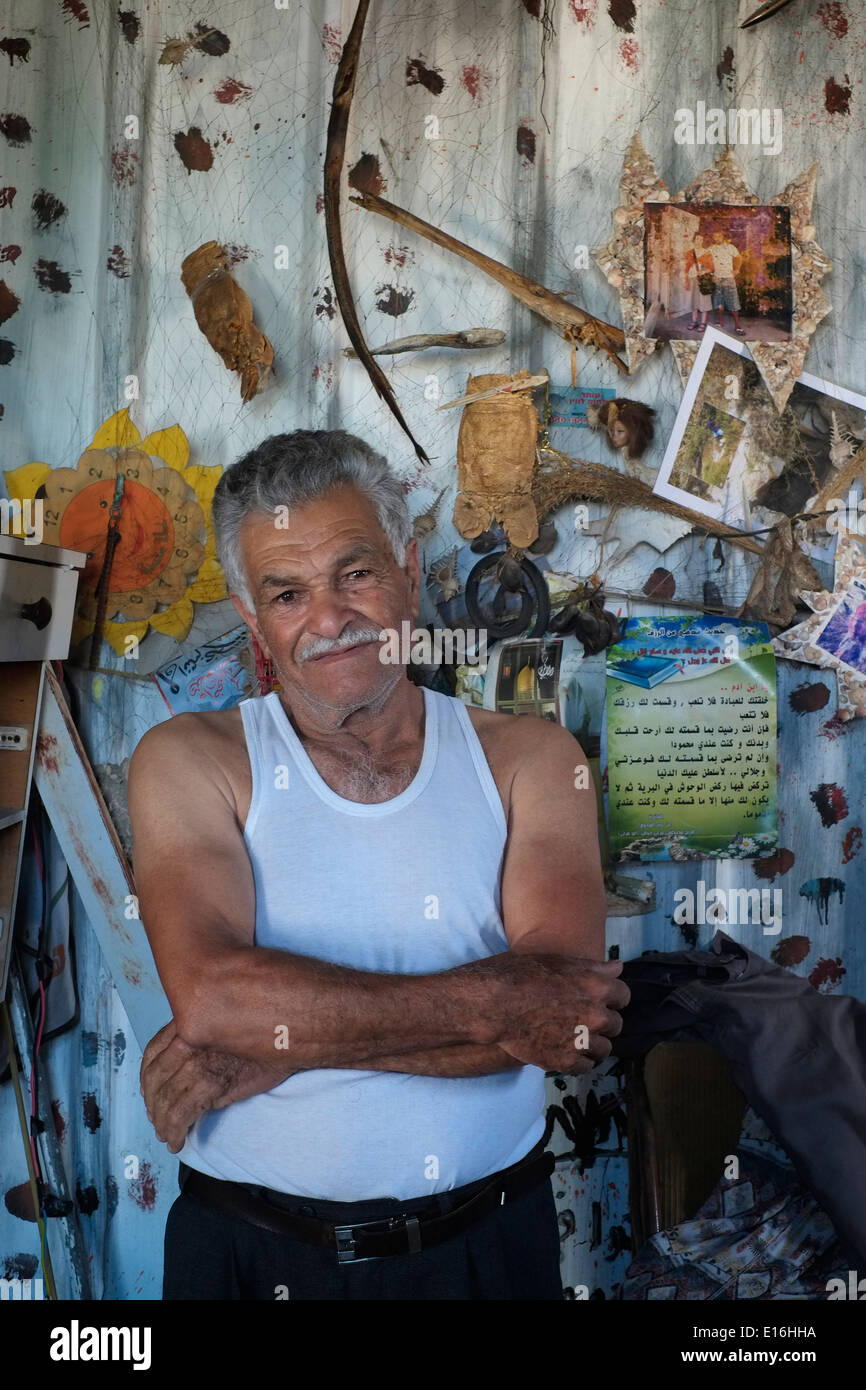 A fisherman posing at the Israeli Arab town of Jisr az Zarqa or Gisr a ...