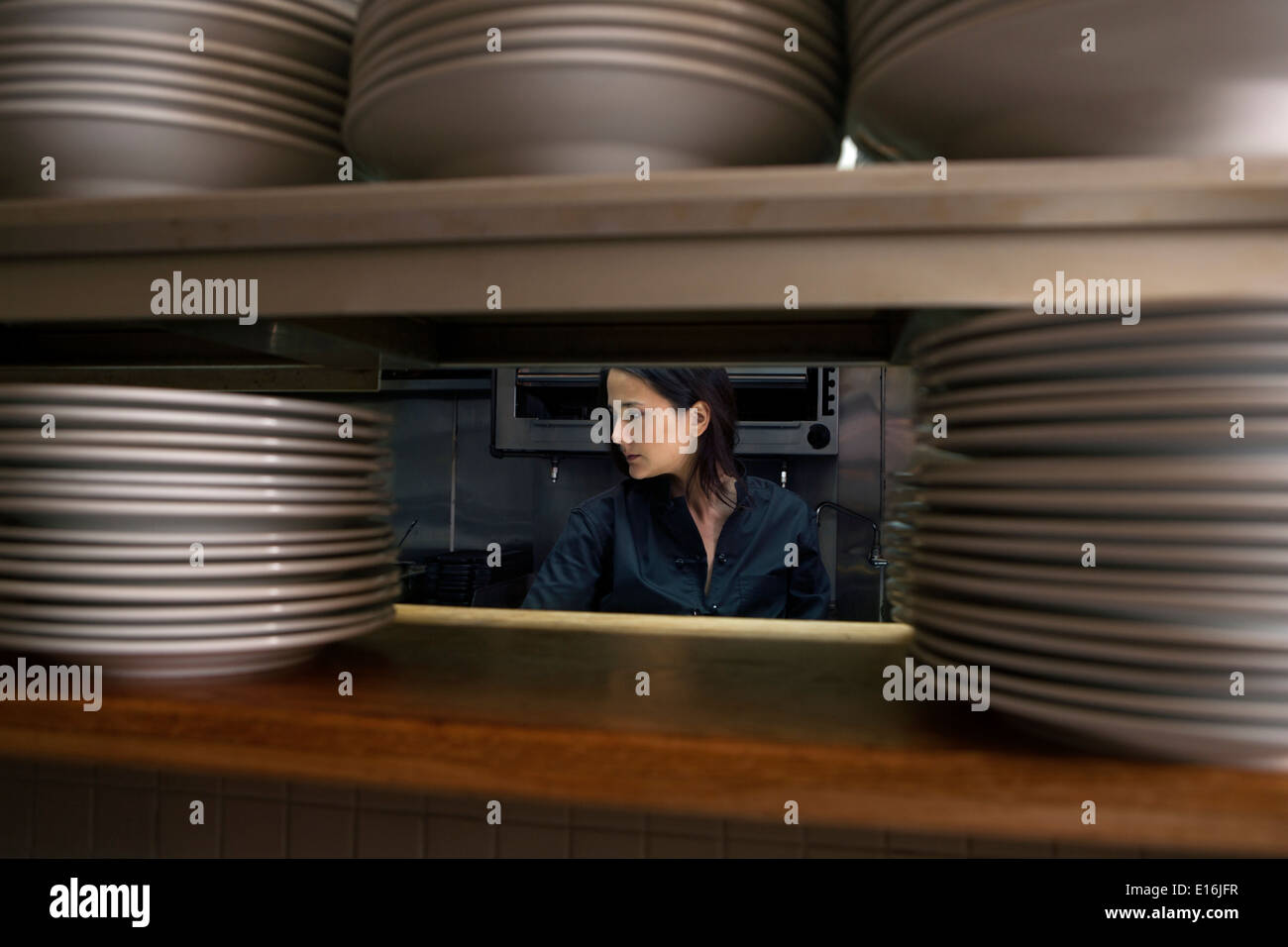 Woman in restaurant working hi-res stock photography and images - Alamy