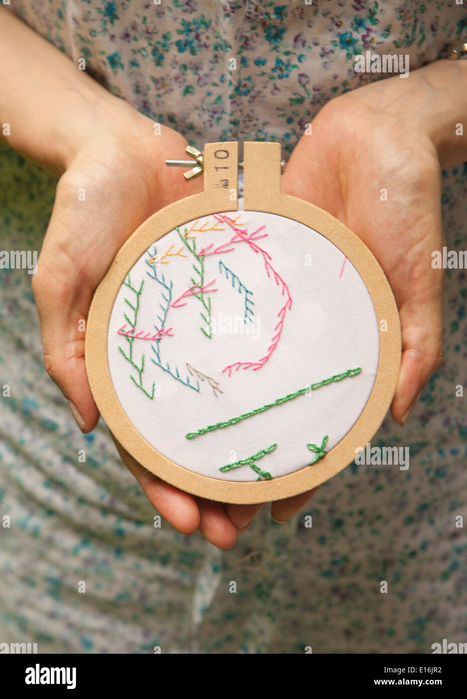 Woman sewing cross stitch hi-res stock photography and images - Alamy