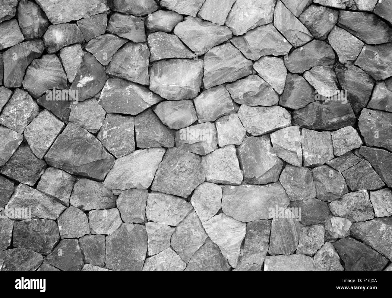Walls made of many small stones before sharing Stock Photo - Alamy