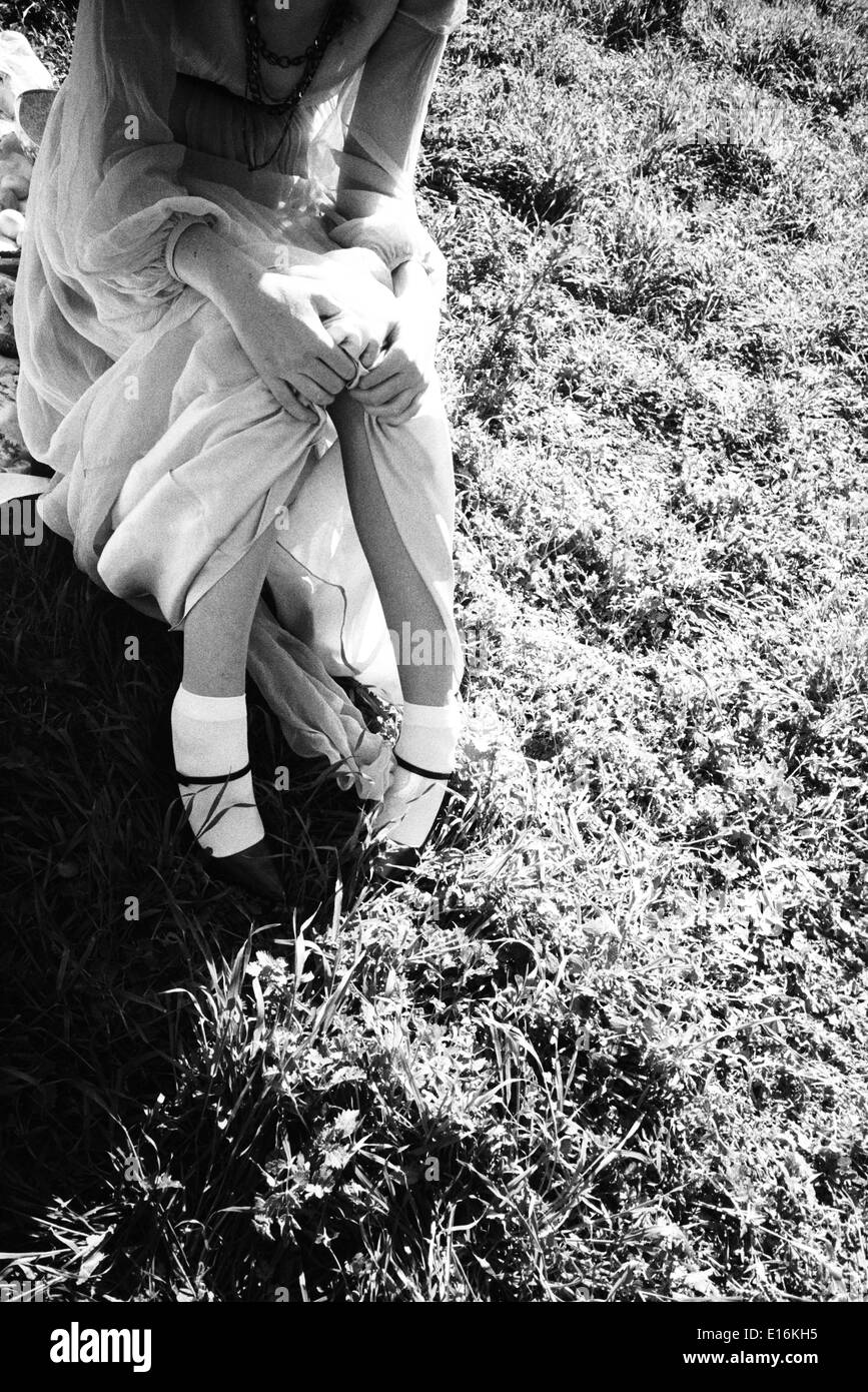 Young woman outdoors holding Black and White Stock Photos & Images - Alamy