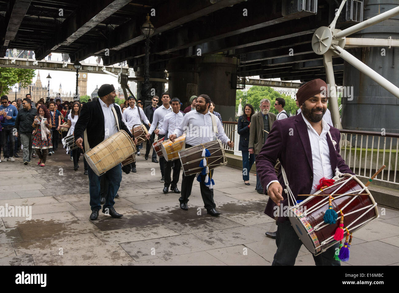 A band of Dhol drummers entertain the crowds outside the Queen ...