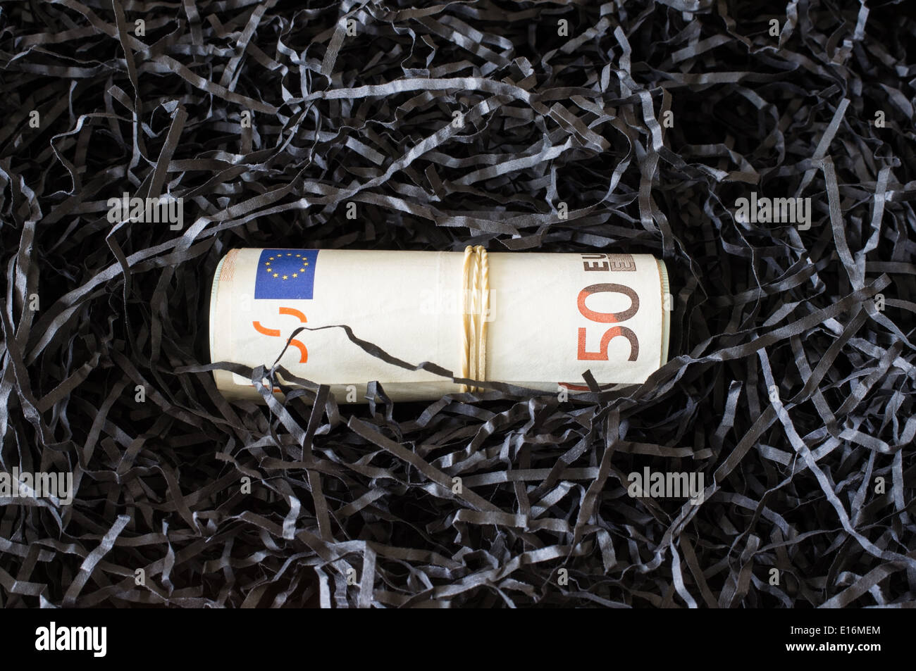 Roll of Euro banknotes in gift box Stock Photo - Alamy