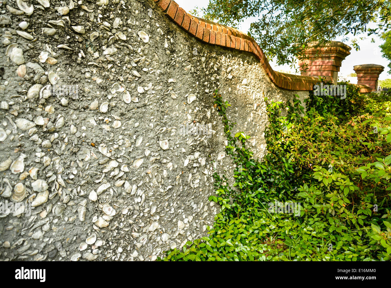 A lovely curved garden wall made from Tabby, a concrete like building ...