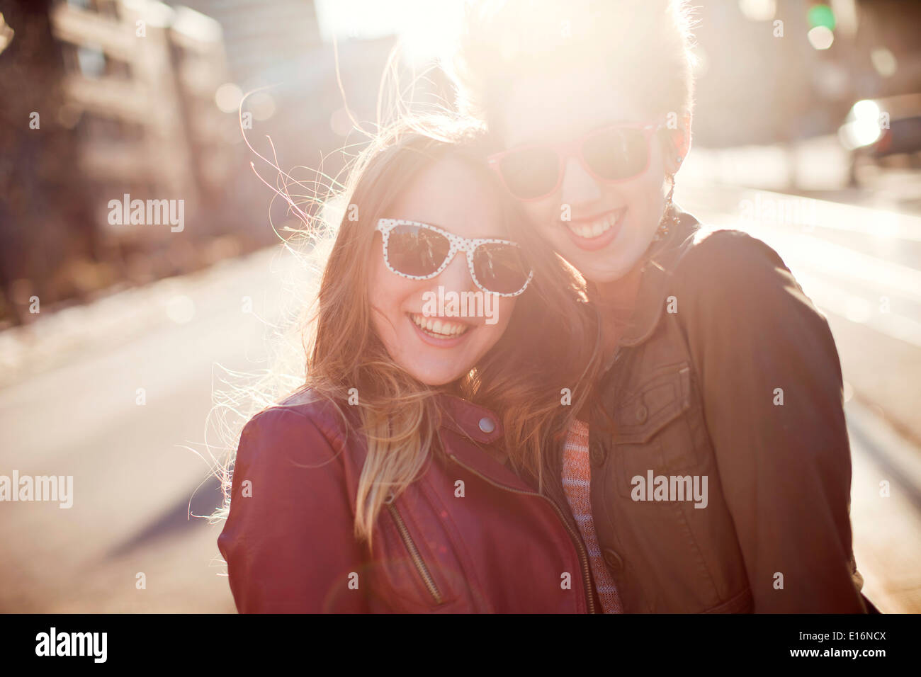 Half-length portrait of two girlfriends laughing, Boston, Massachusetts ...