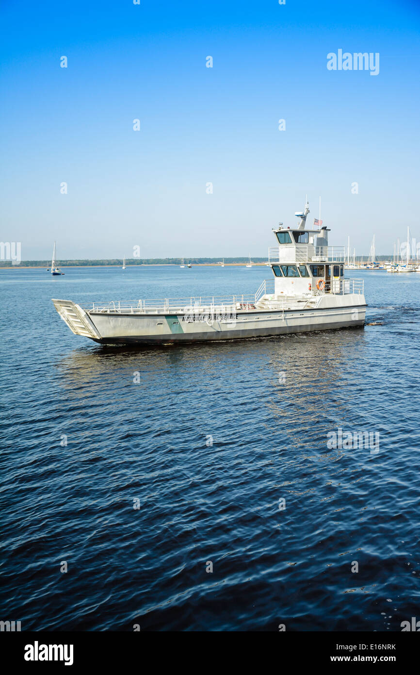 A landing craft owned by the U.S. National Park Service cruises the St ...