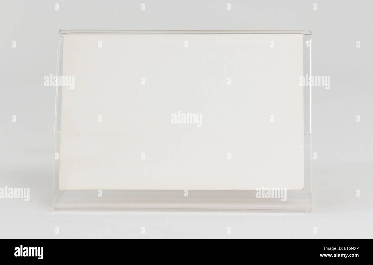 Acrylic card holder object with white background Stock Photo - Alamy