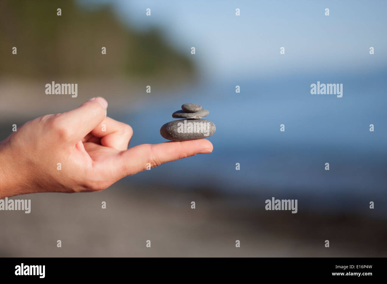 Finger balanced hi-res stock photography and images - Alamy