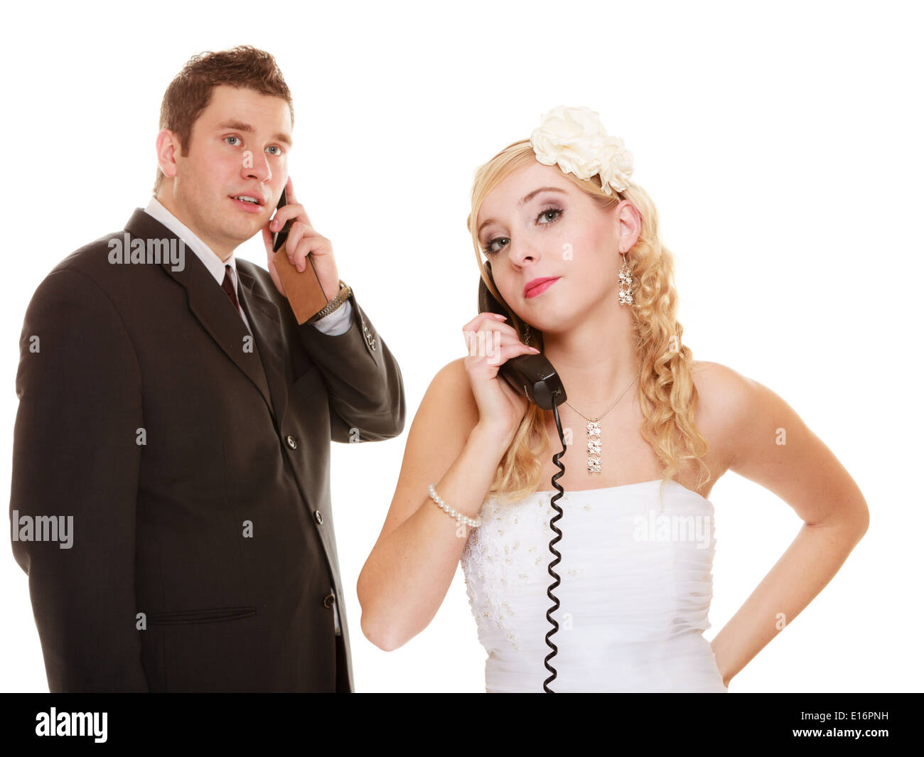 Wedding day. Just married talking by mobile phone telephone problems ...