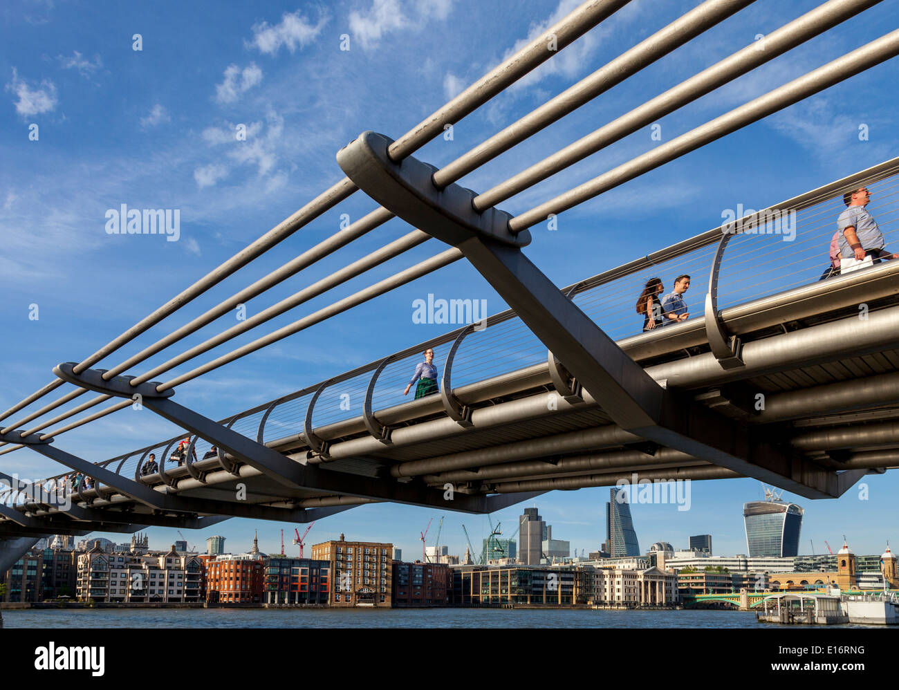 People Crossing The Millennium Bridge, London, England Stock Photo - Alamy