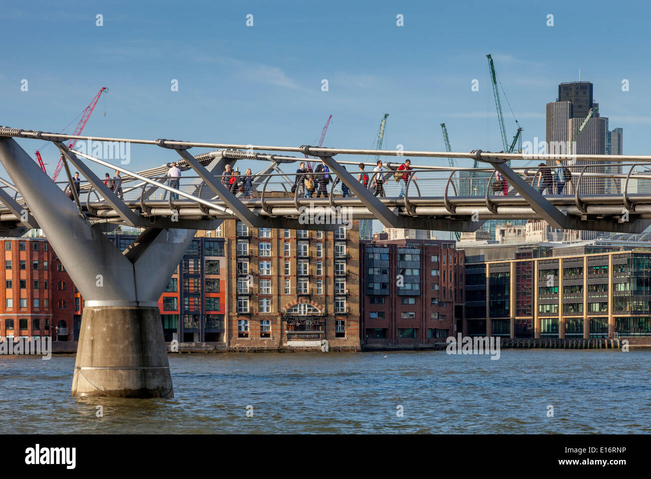 People Crossing The Millennium Bridge, London, England Stock Photo - Alamy