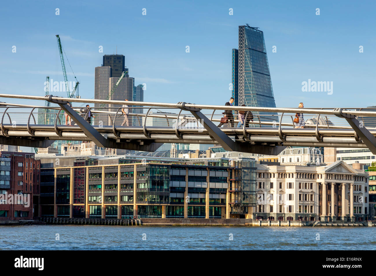 People Crossing The Millennium Bridge, London, England Stock Photo - Alamy
