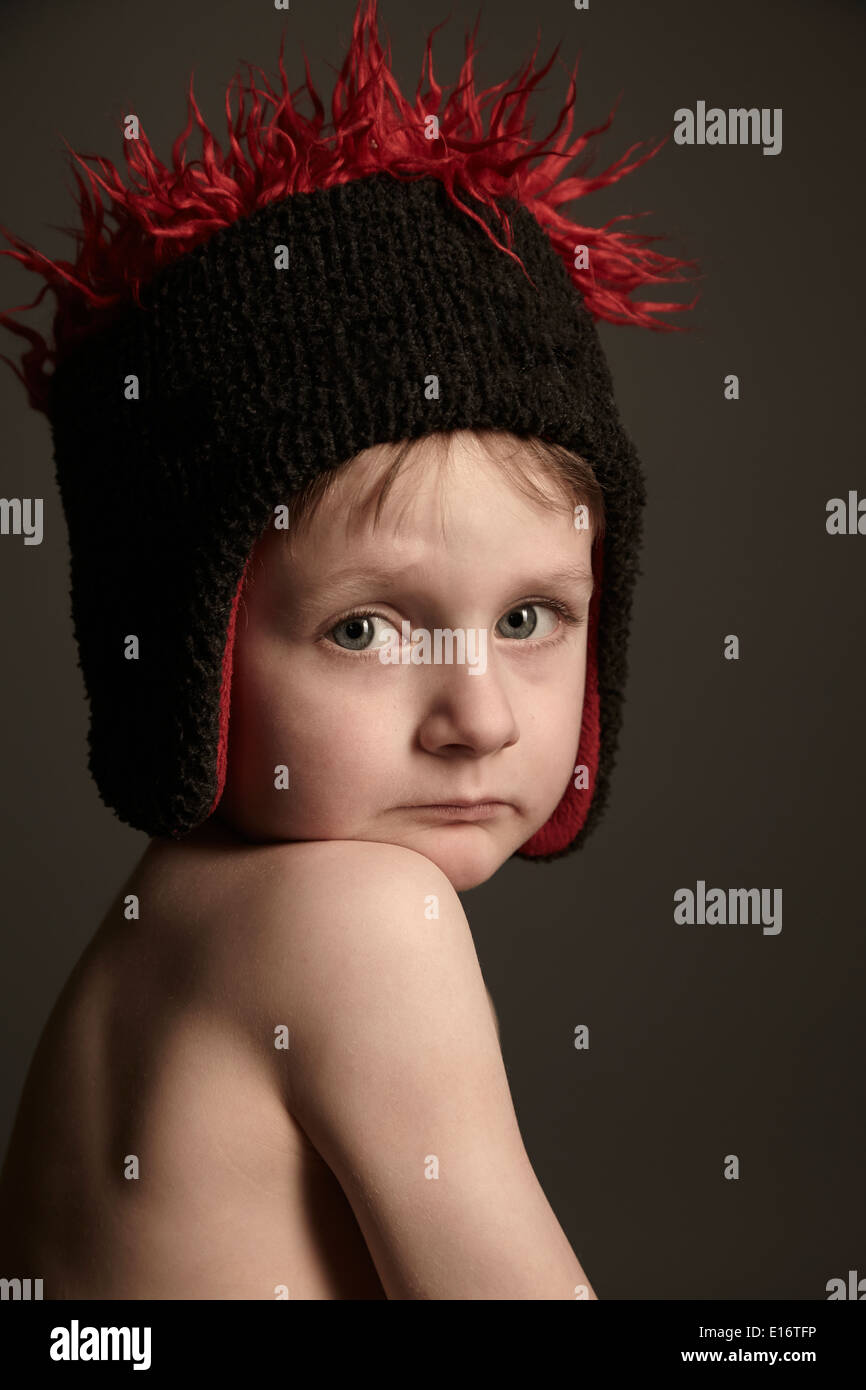 Boy with red cap hi-res stock photography and images - Alamy