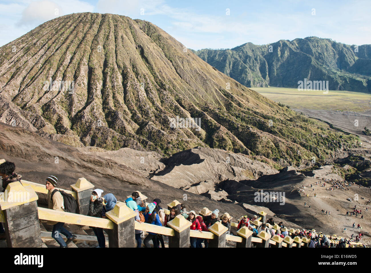 tourists climbing up to the crater of Mount Bromo, East Java, Indonesia ...