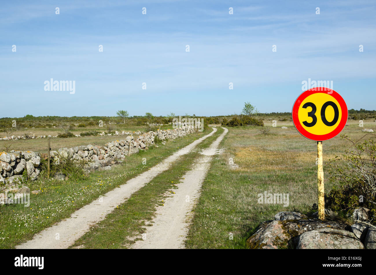 Speed limit sign at rural tracks in a plain grassland Stock Photo - Alamy