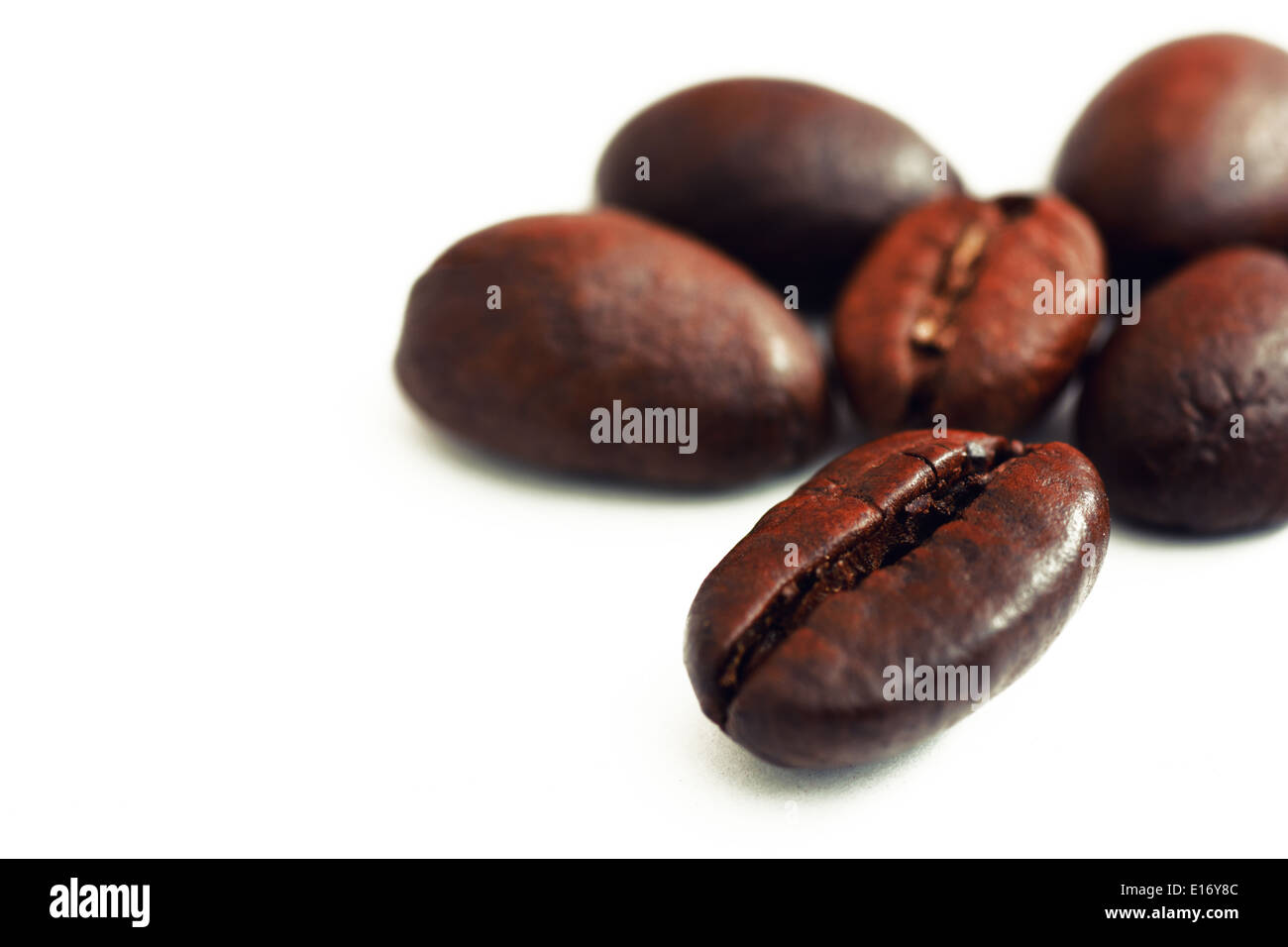 Close up of coffee beans on white background Stock Photo - Alamy
