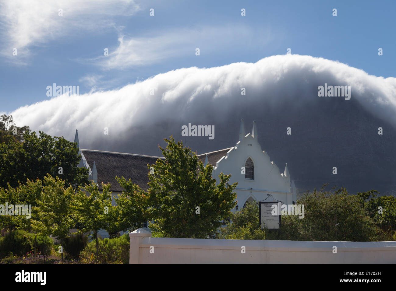 Tube Cloud Over House