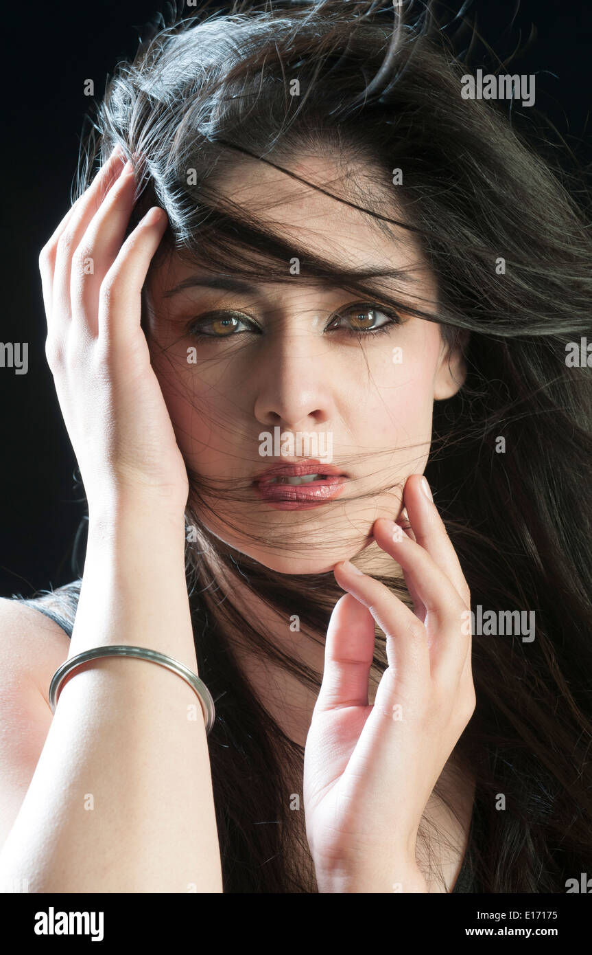 Beautiful young woman hands touching face Stock Photo: 69610777 - Alamy
