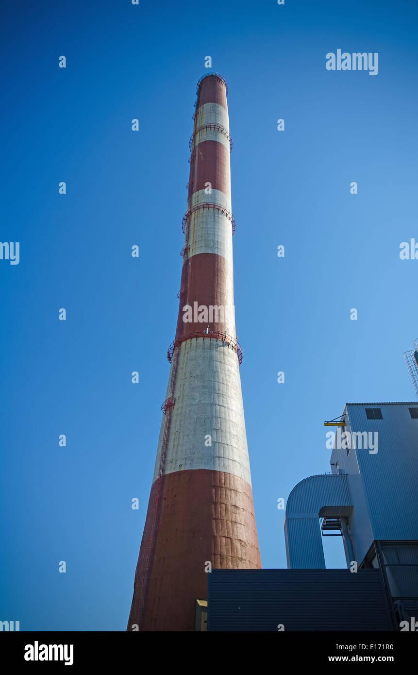 Perspective view of chimney of thermal power plant Stock Photo - Alamy