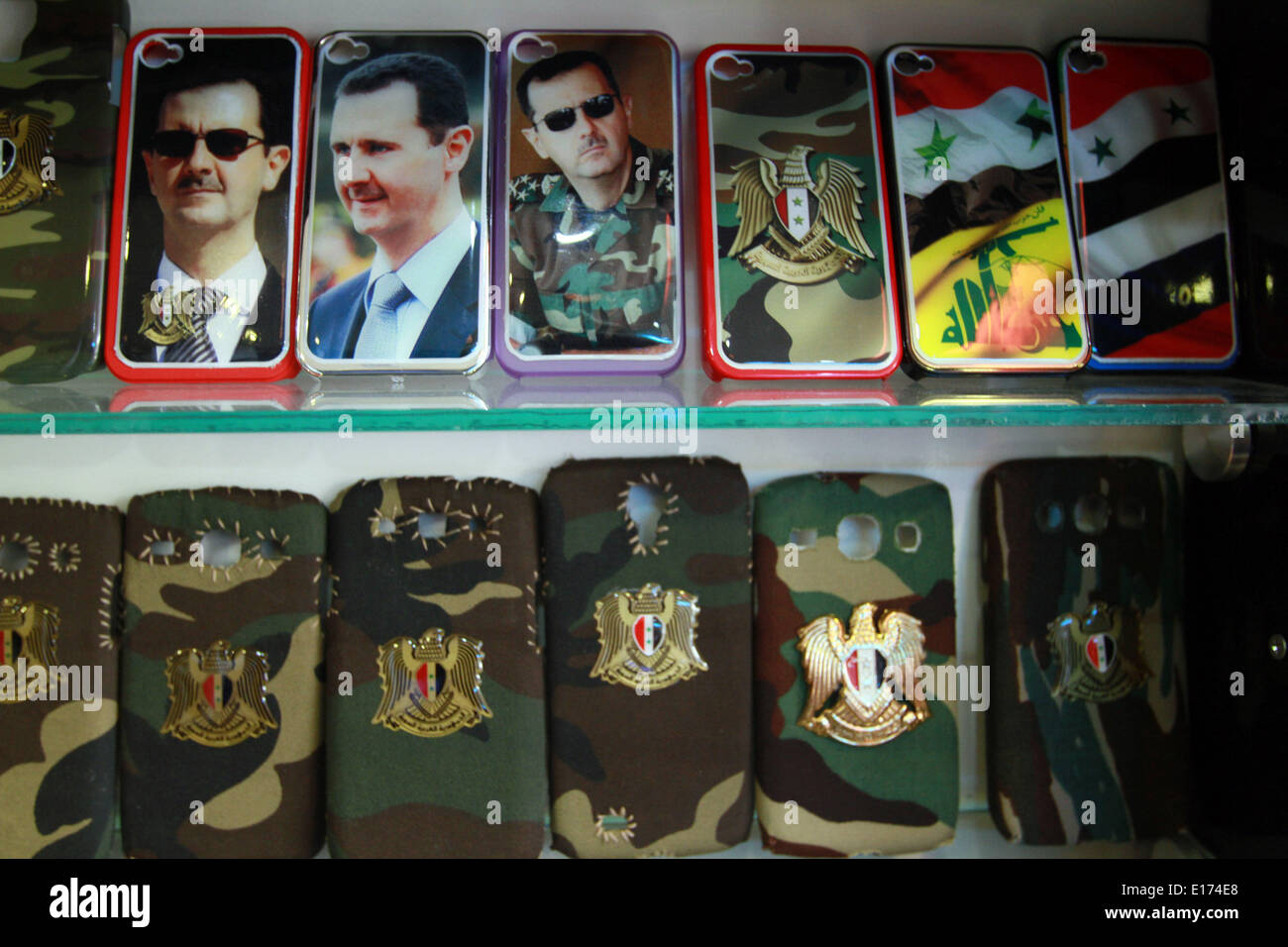 Damascus, Damascus. 25th May, 2014. Photos of Syrian President Bashar ...