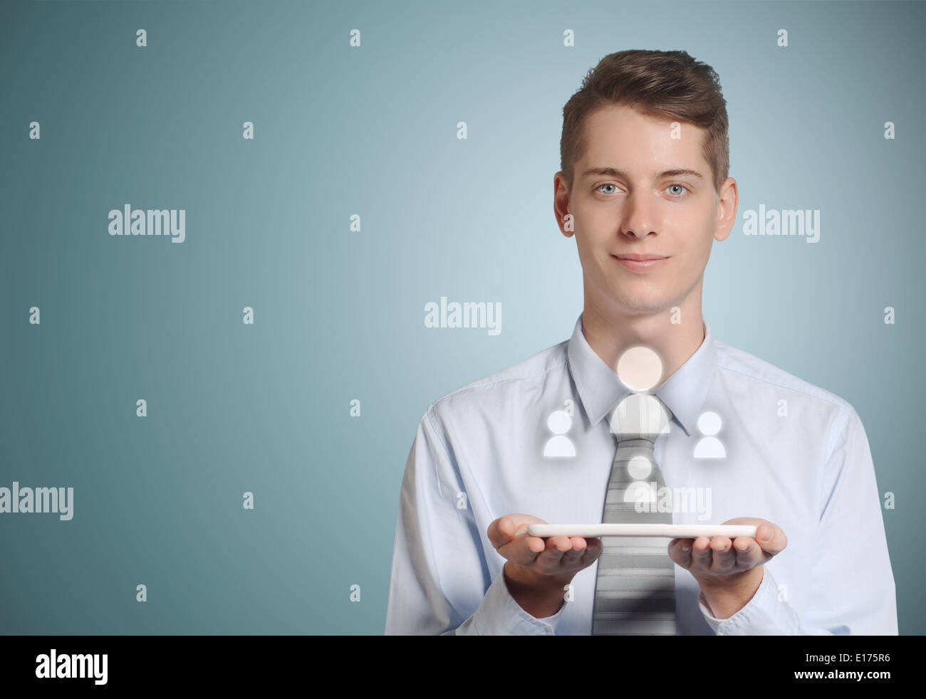 Businessman holding computer tablet with social media people icons in ...