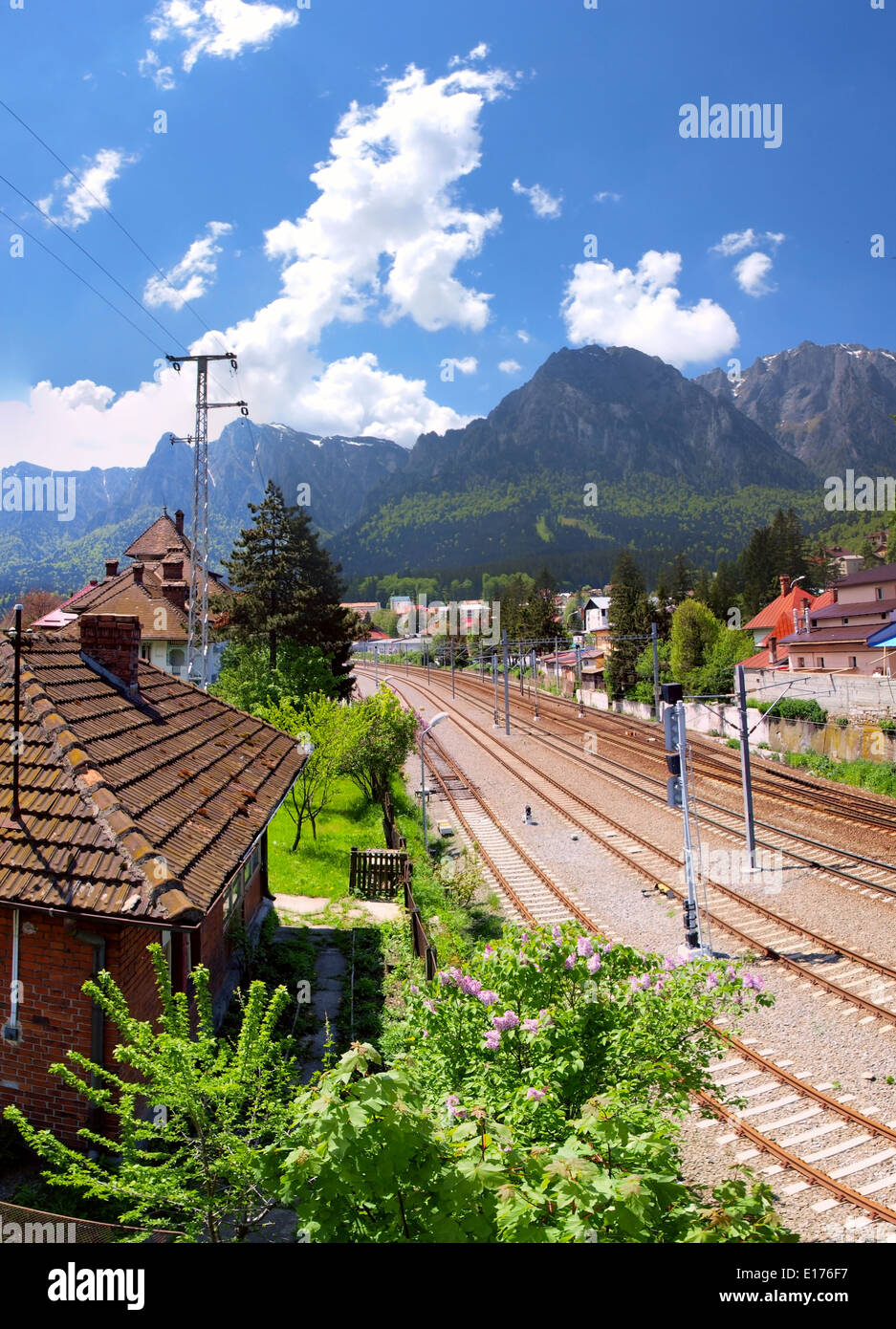 View over Bucegi mountains and train station in Busteni, Romania Stock ...