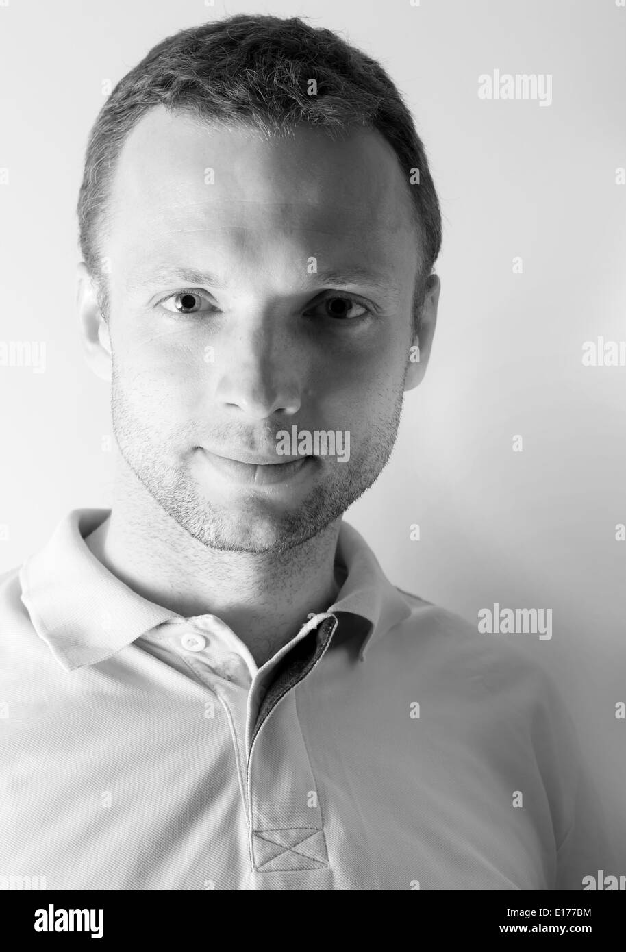 Happy black man white shirt hi-res stock photography and images - Alamy