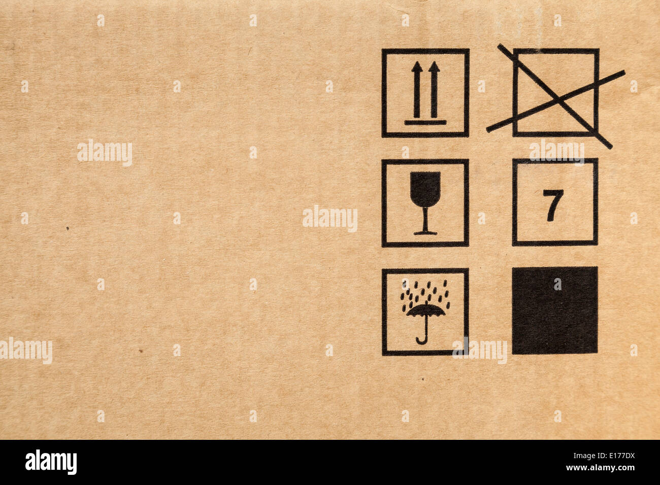 Brown modern cardboard with signs, background texture Stock Photo - Alamy