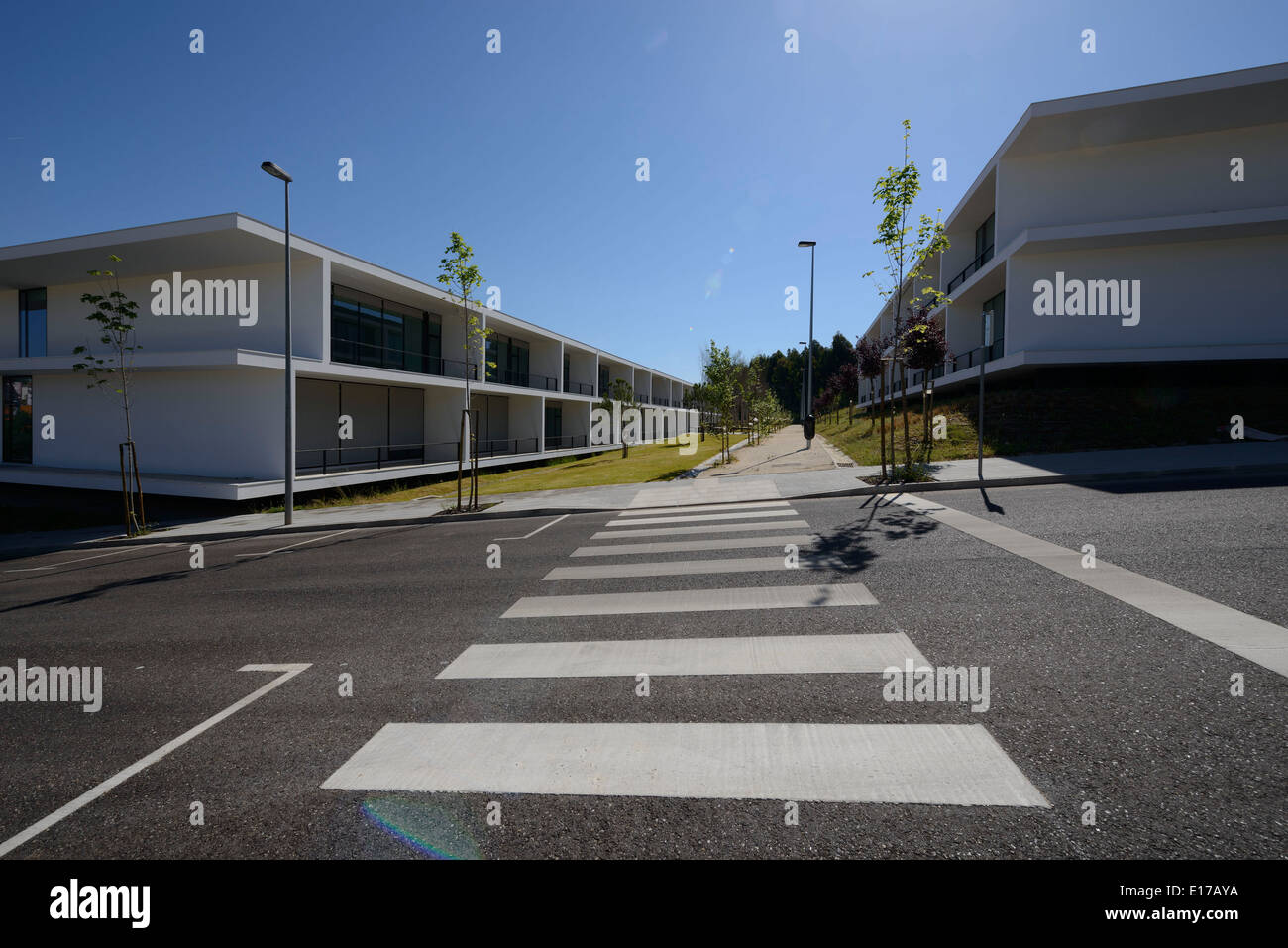 Crosswalk in neighborhood with modern architecture building Stock Photo ...
