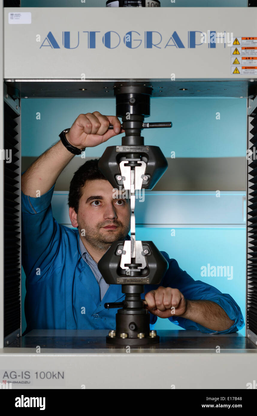 Person using a Shimadzu Autograph AG-IS 100kN universal testing ...