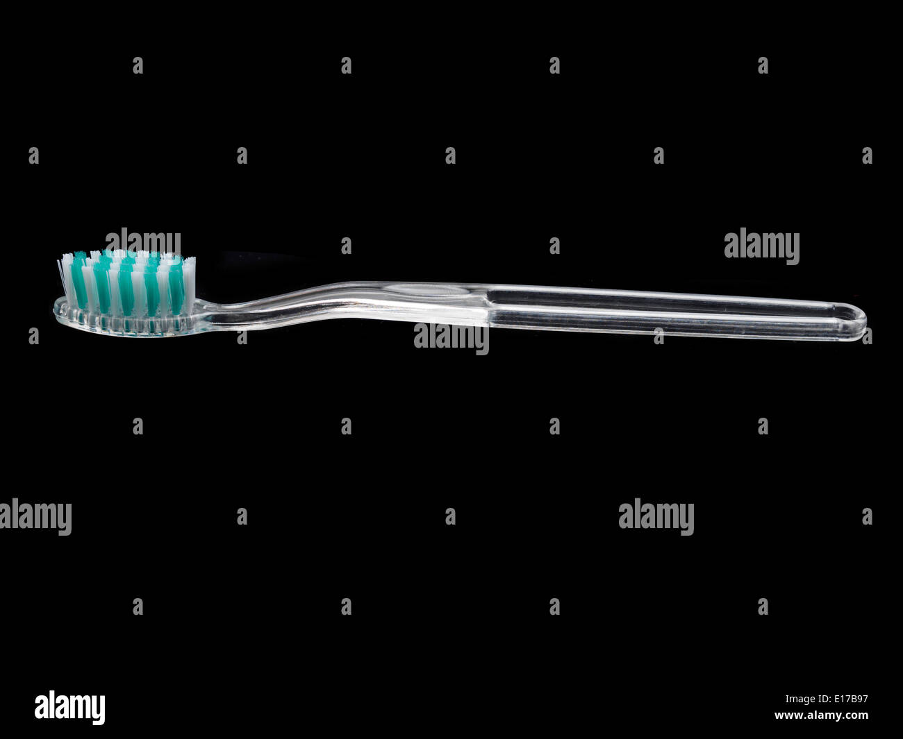 Transparent plastic toothbrush isolated on black background Stock Photo ...