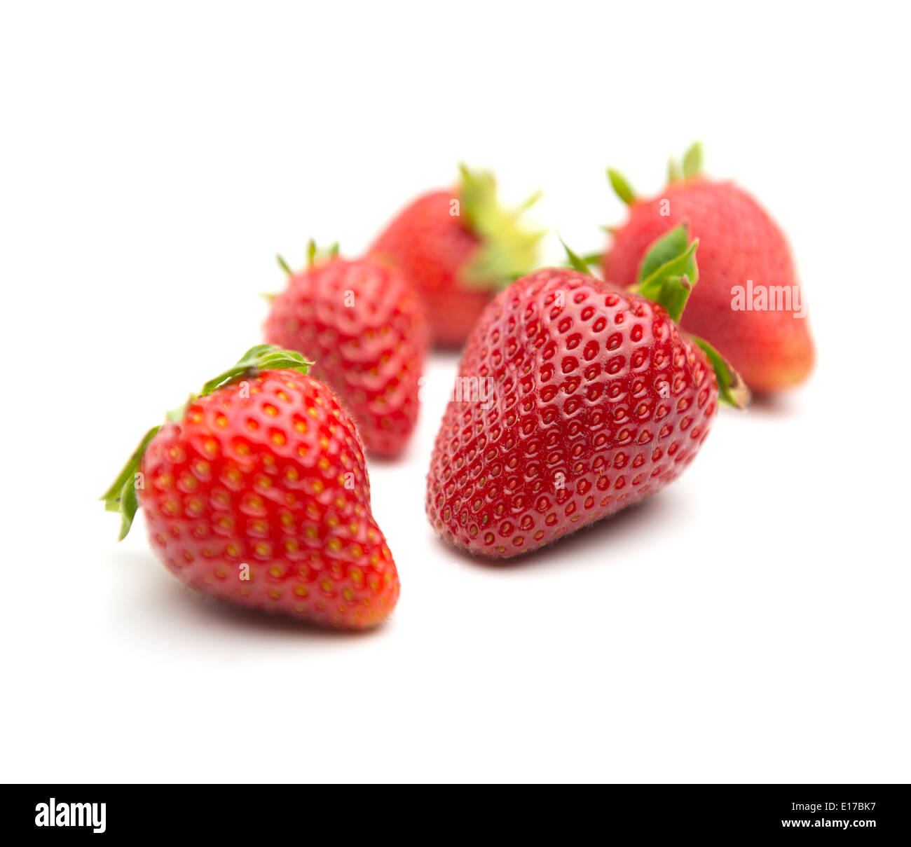 Strawberries cut out isolated on white background Stock Photo - Alamy